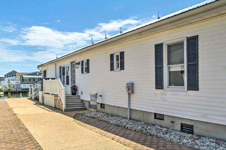 Fire Pit + Views: Canal-front Fenwick Island Home - Delaware