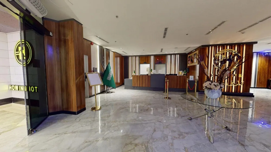 How Inn Hotel - 馬迪納