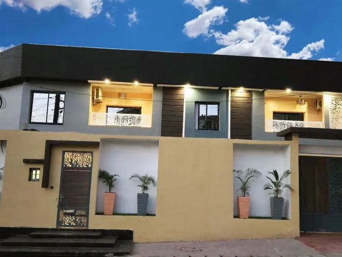 Suna'a Home Logpom - Douala